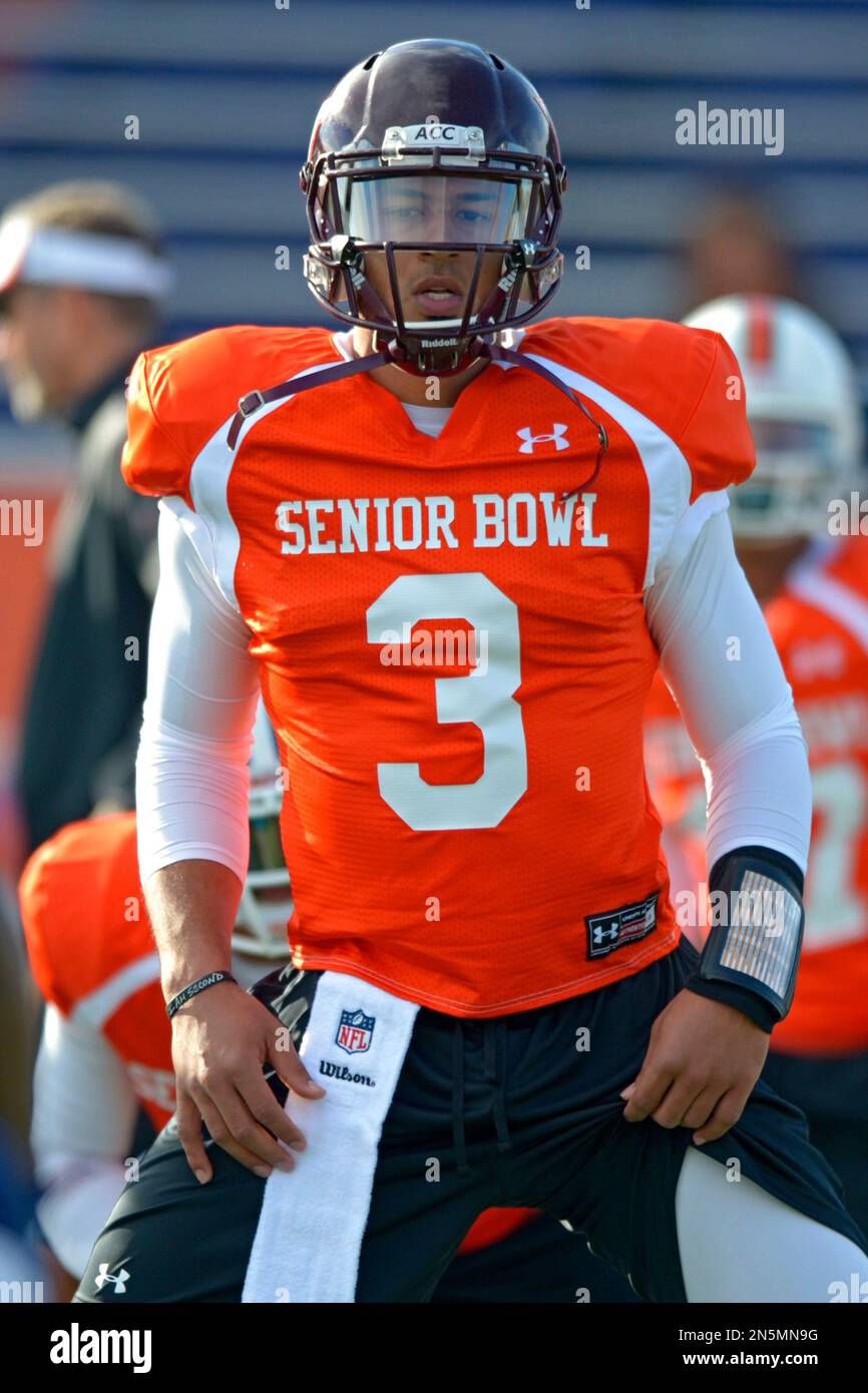 North Squad quarterback Logan Thomas of Virginia Tech (3) stretches ...