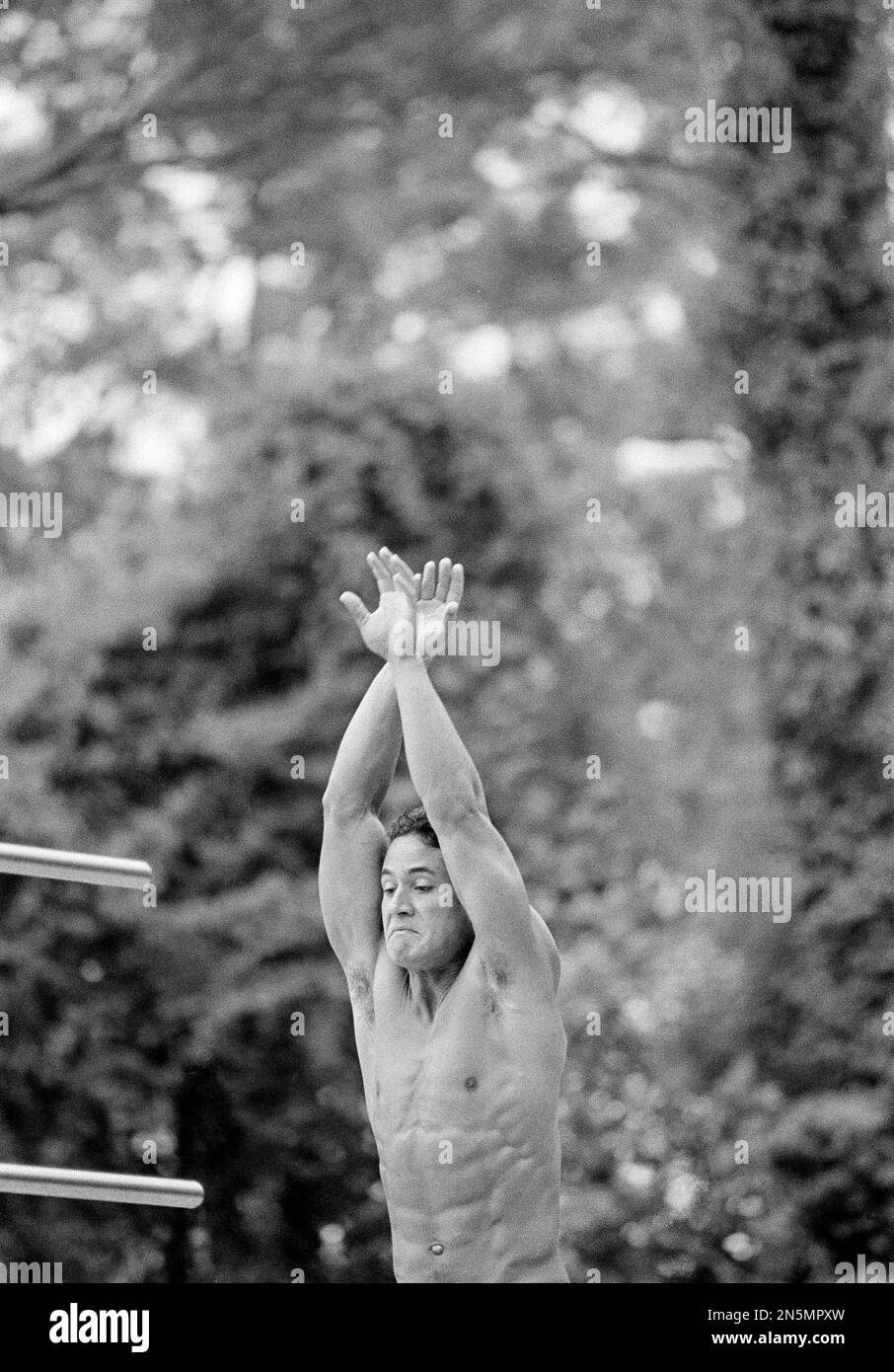 U.S. diver Greg Louganis dives from the 3-meter board during the final ...