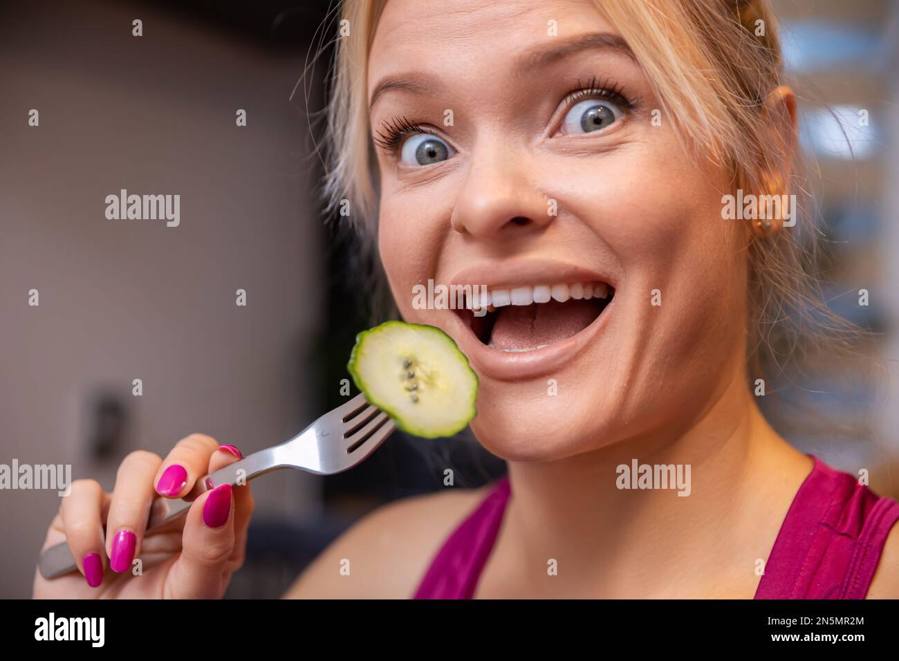 close-up on a woman's face making funny faces with her mouth open Stock ...