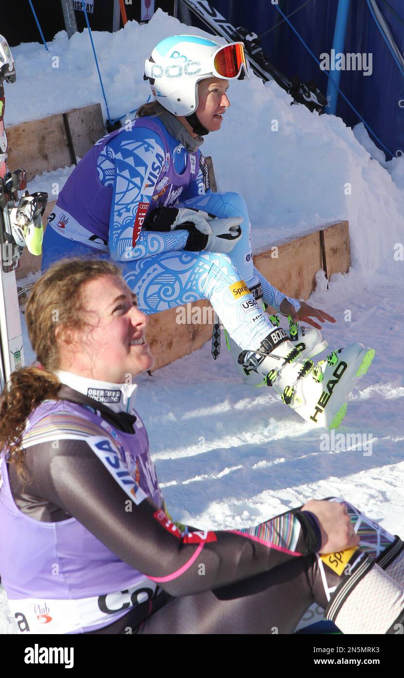 Julia Mancuso, of the US, top, sits with compatriot Stacey Cook as they ...