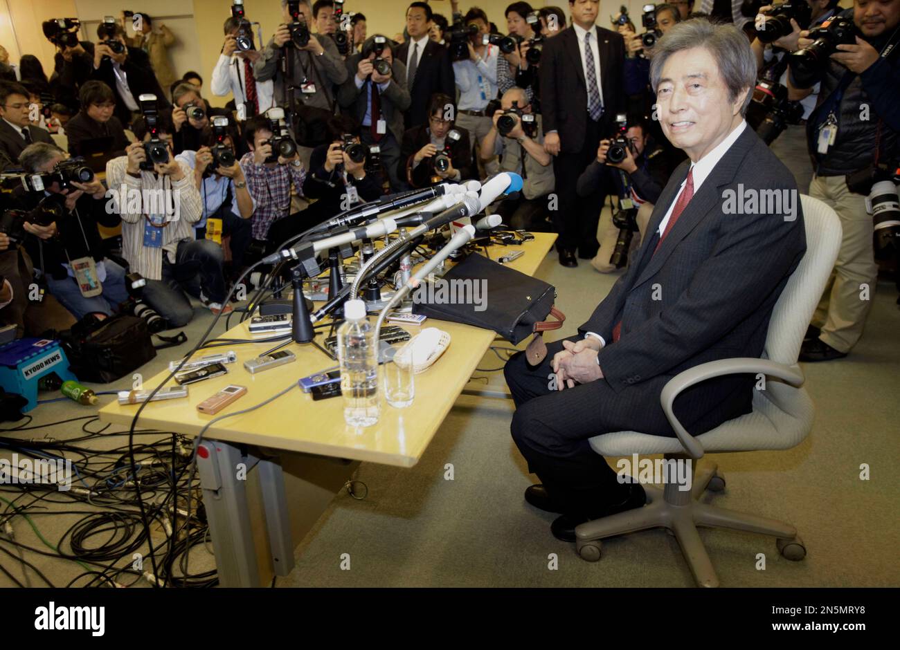 Former Japanese Prime Minister Morihiro Hosokawa poses for photos before his press conference at ...
