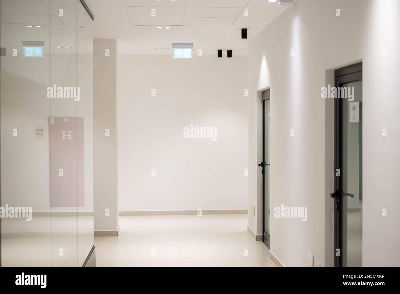 An interior of hall with white walls Stock Photo - Alamy