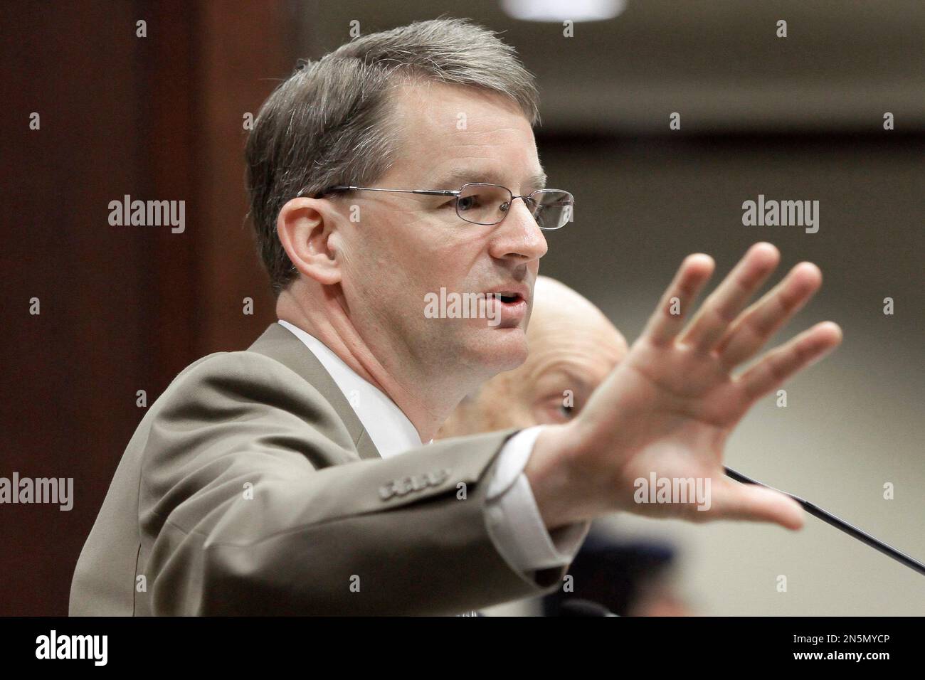 Andy Allison, Arkansas state Medicaid director, gestures as he ...