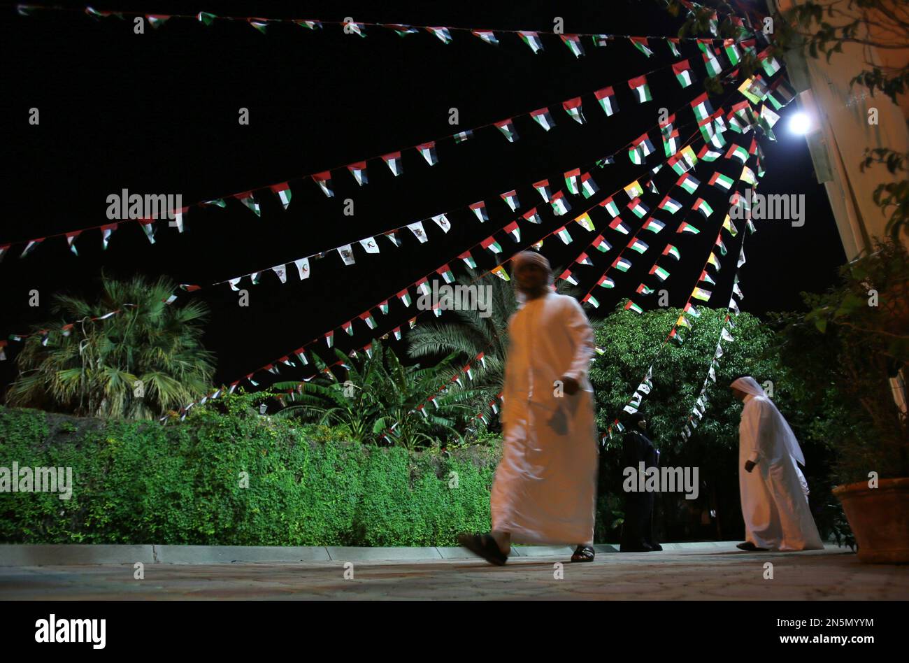 Emirati men arrive at the Emirates Human Rights Association in Dubai to ...
