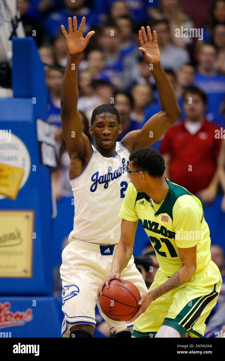 Kansas center Joel Embiid, back, guards Baylor center Isaiah Austin (21 ...