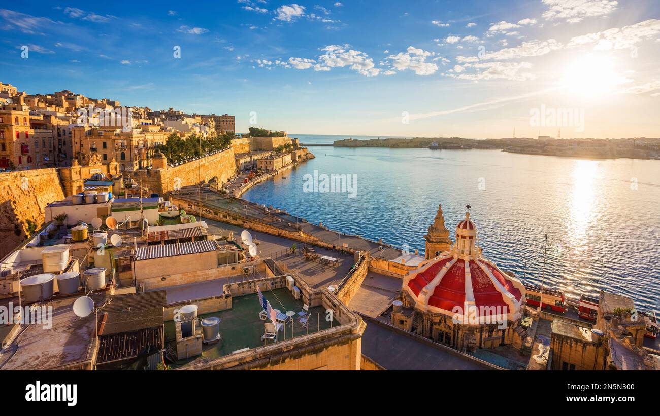 Valletta, Malta - Beautiful golden sunrise at the Grand Harbour of ...