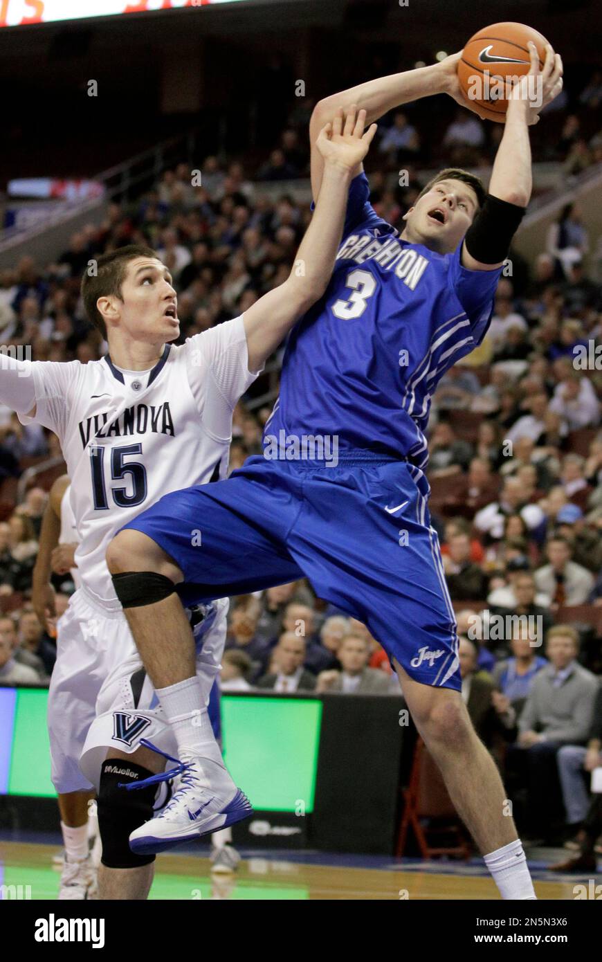 Creighton's Doug McDermott (3) tries for a shot past Villanova's Ryan ...