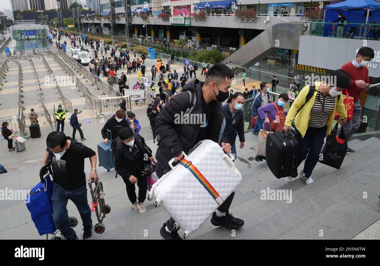 Travellers arrive at Lo Wu Control Point in Shenzhen, and ready to ...