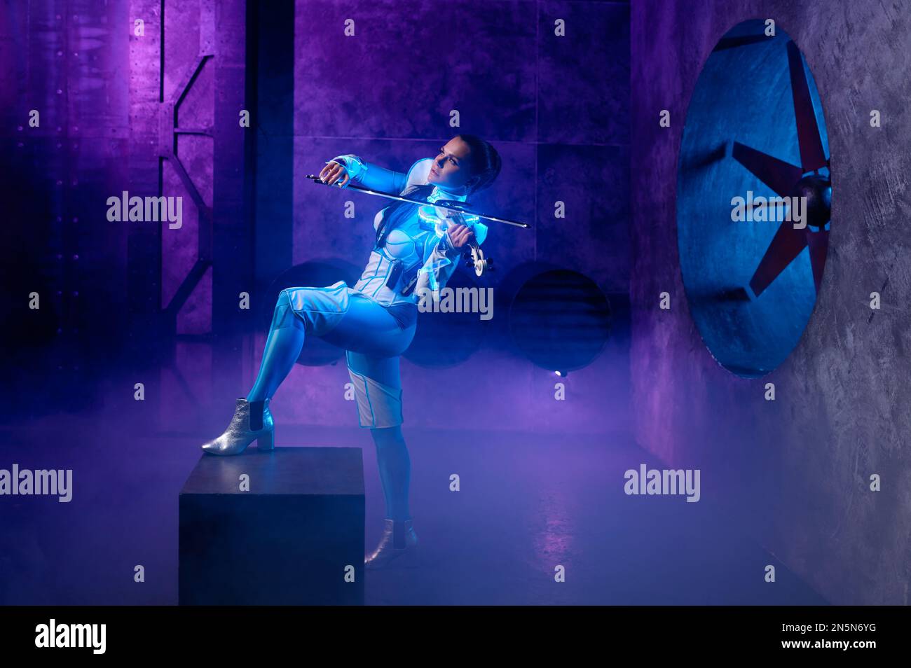 Young woman violinist performing electronic music on violin Stock Photo ...