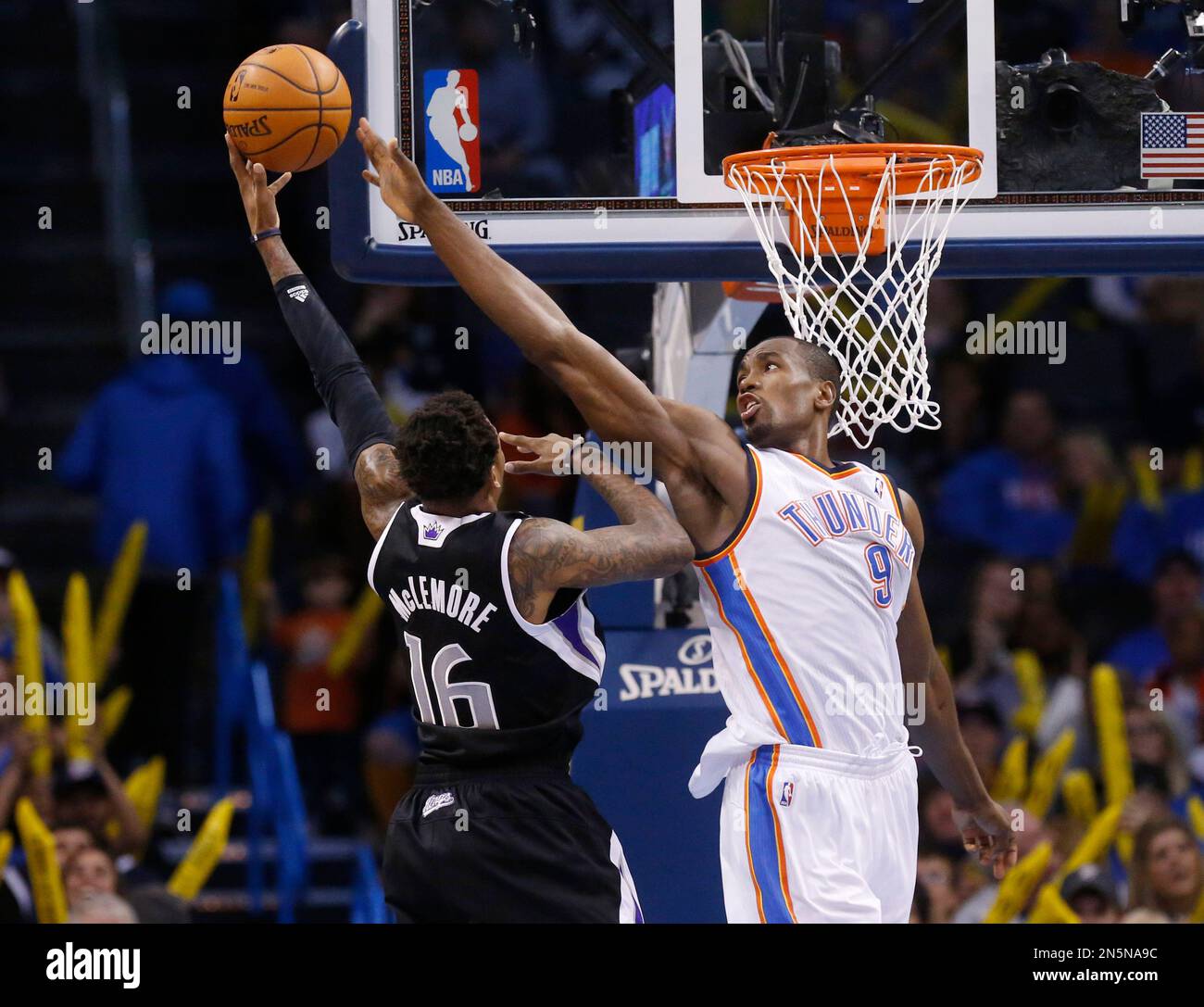 Oklahoma City Thunder forward Serge Ibaka (9) defends as Sacramento Kings guard Ben McLemore (16 ...