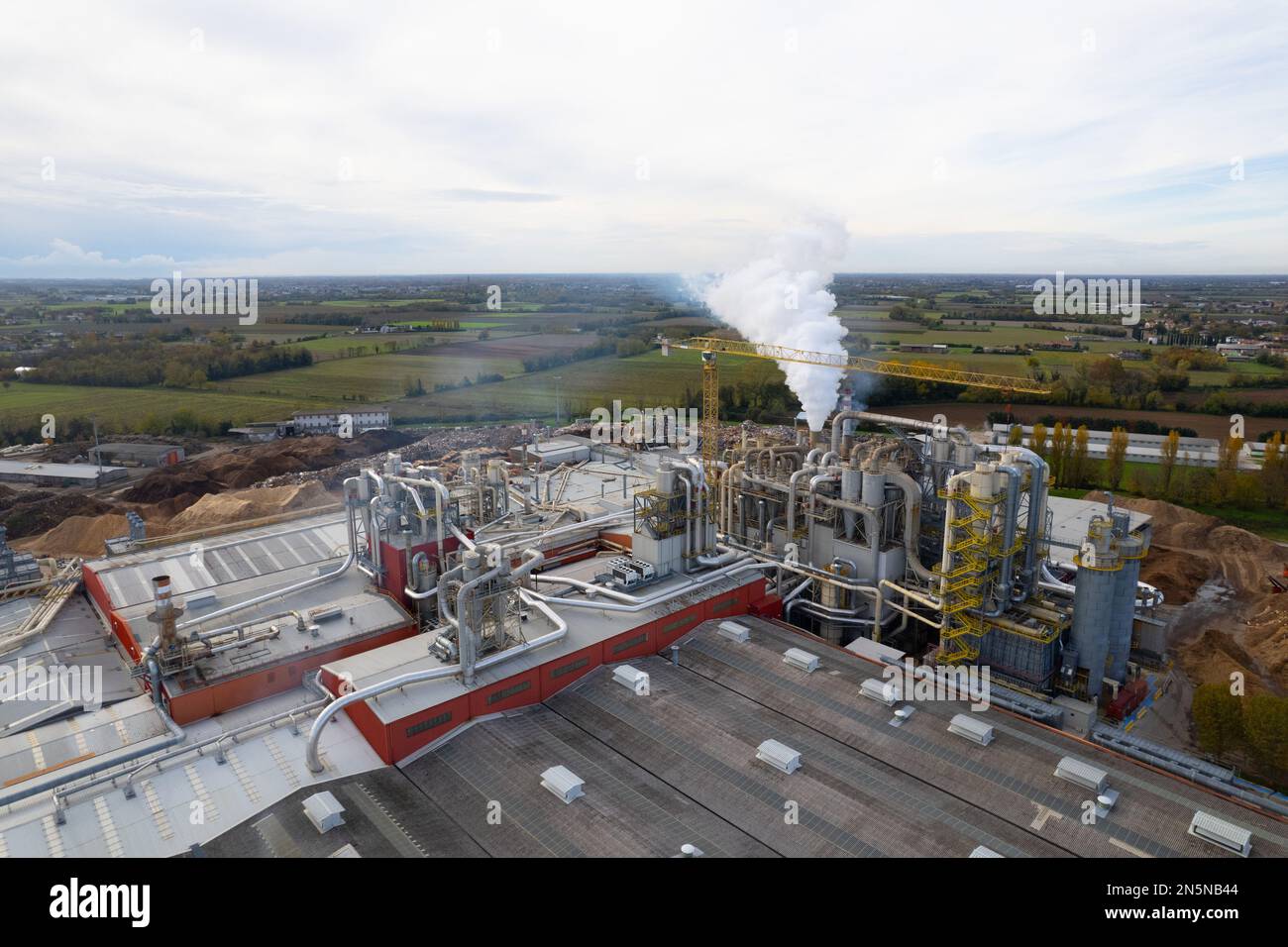 An aerial shot of the factory in Bipan producing wood panels, Udine ...