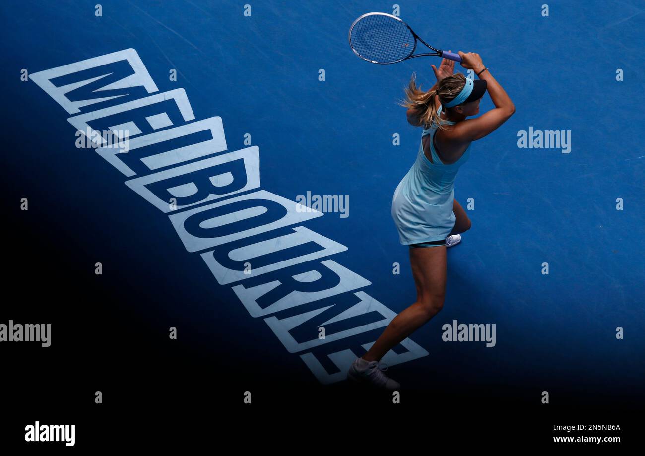 Maria Sharapova of Russia follows through on a shot to Dominika ...
