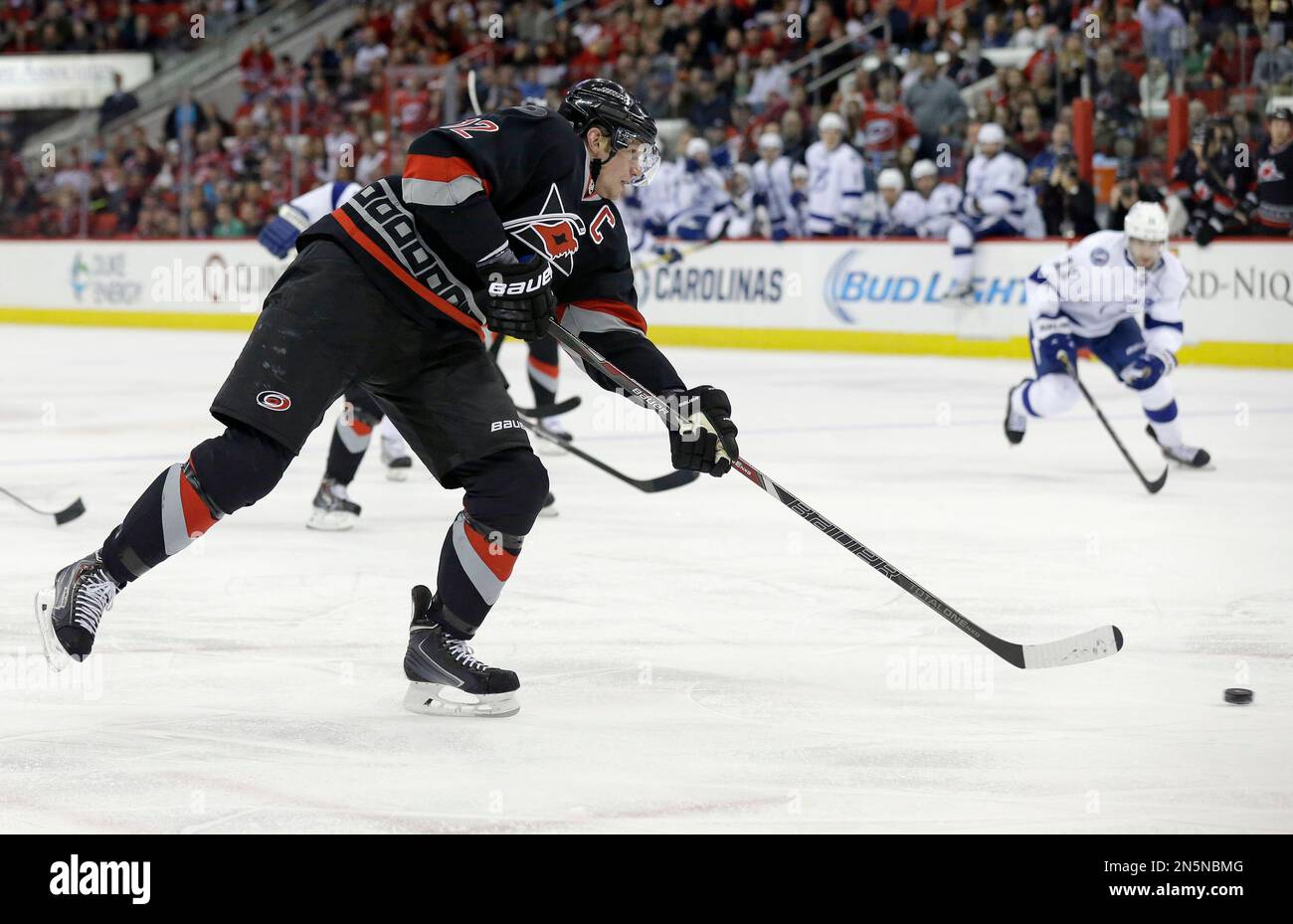 Carolina Hurricanes' Eric Staal shoots and scores against the Tampa Bay ...