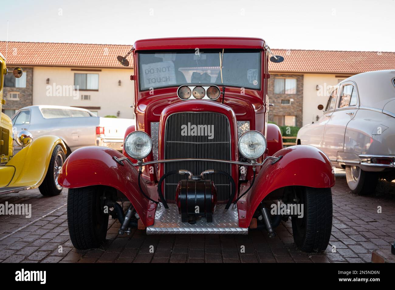 A front detail view of a red hot rod based on a Ford Model A Stock ...