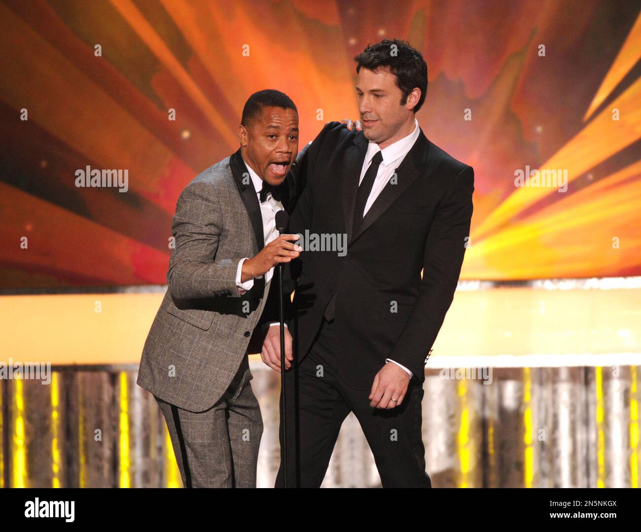 Cuba Gooding Jr., left, and Ben Affleck speak on stage at the 20th ...