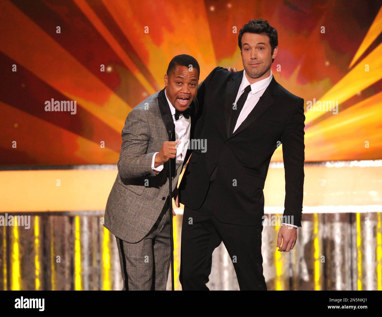 Cuba Gooding Jr., left, and Ben Affleck speak on stage at the 20th ...