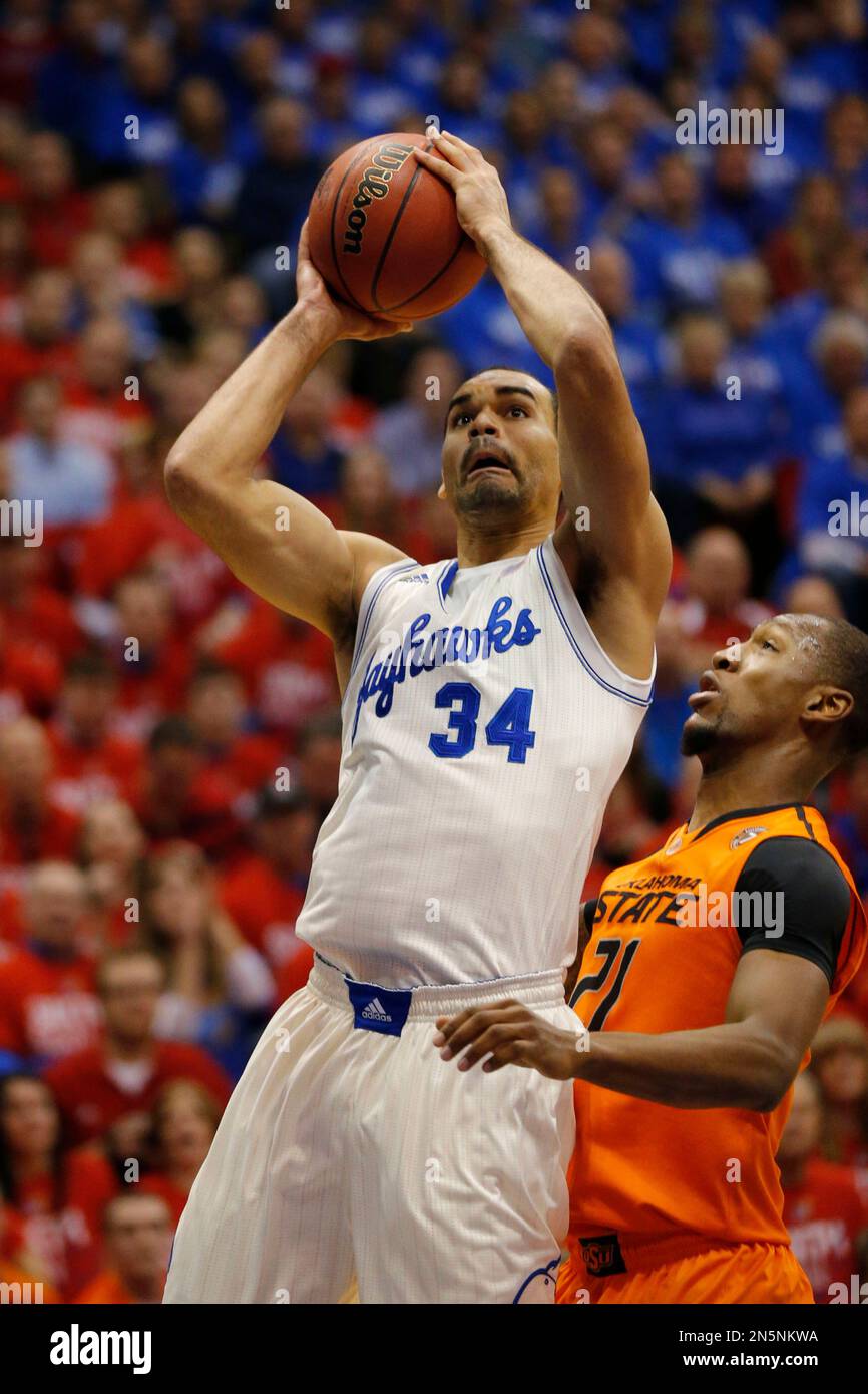 Kansas forward Perry Ellis (34) and Oklahoma State forward Kamari ...