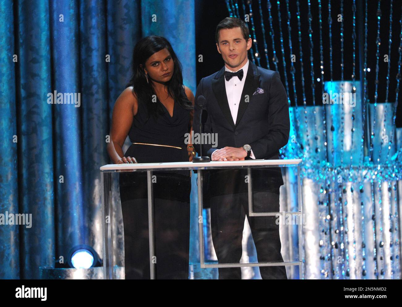 Mindy Kaling, left, and James Marsden speak on stage at the 20th annual ...