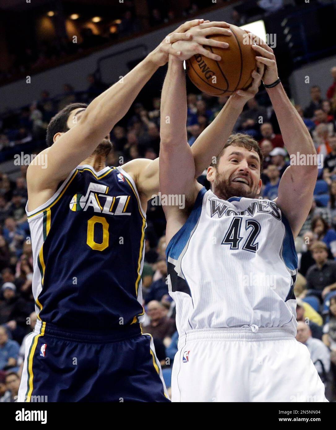 Utah Jazz's Enes Kanter, left, of Turkey, tries to wrestle the ball ...