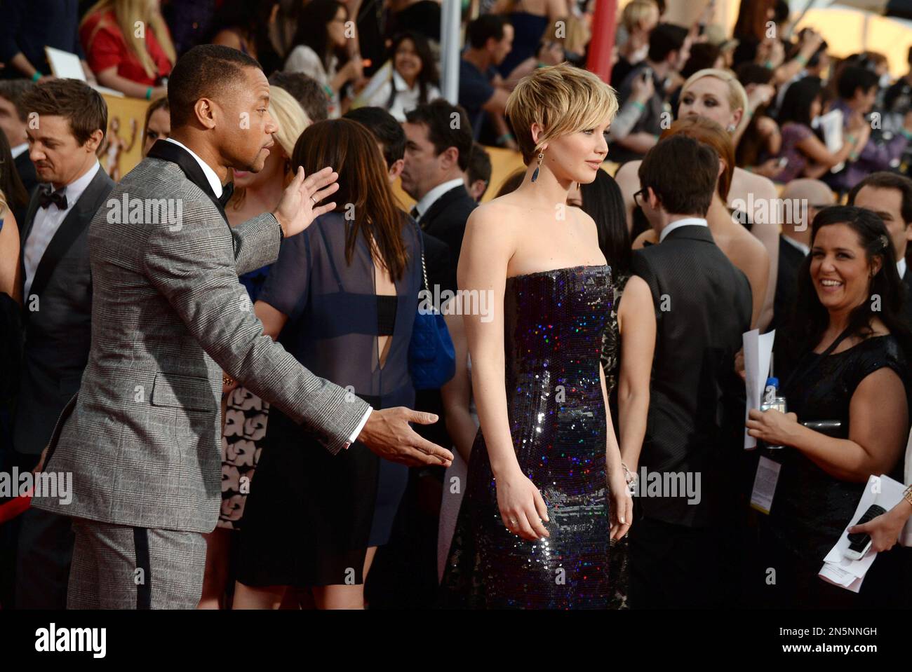 Cuba Gooding Jr., left, and Jennifer Lawrence arrive at the 20th annual ...