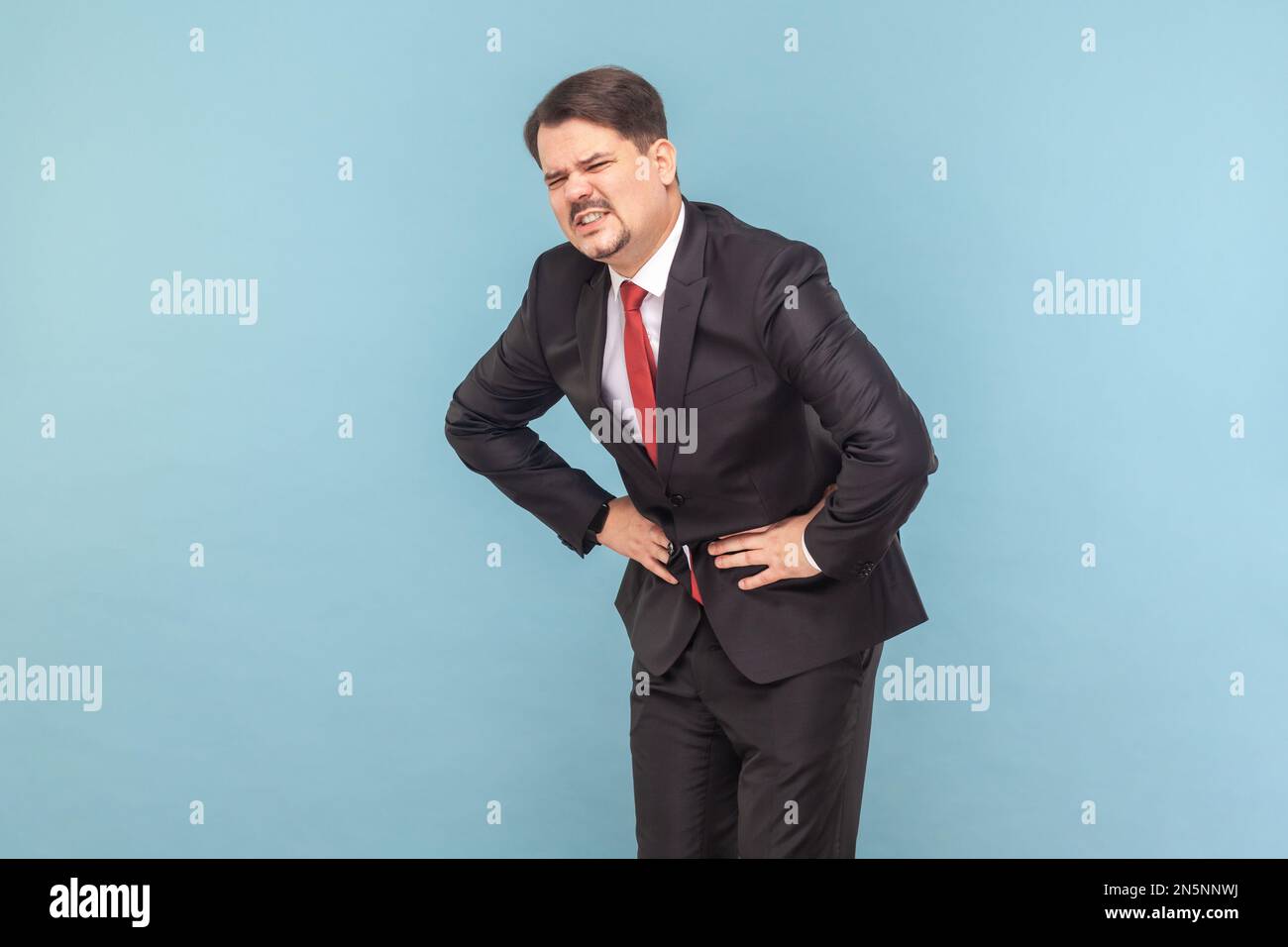 Portrait of sick unhealthy ill man with mustache having strong pain in ...