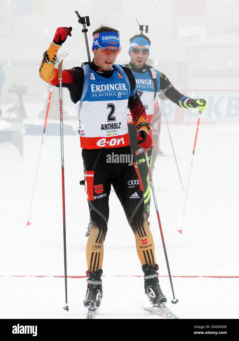 Germany's Simon Schempp crosses the finish line to win a men's Biathlon ...