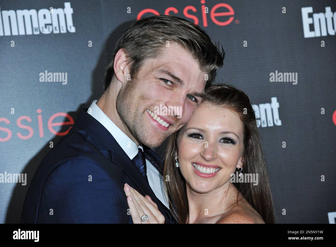 Liam McIntyre, left, and Erin Hasan arrive at the Entertainment Weekly ...