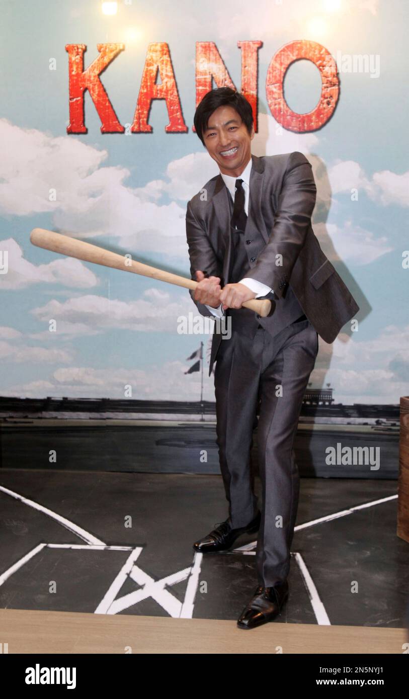 Japanese actor Takao Osawa poses for photos during a media event to ...
