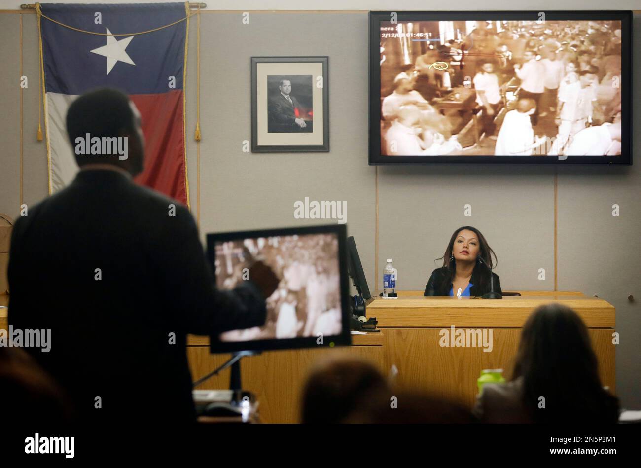 Heath Harris, left, attorney for the prosecution, questions witness Aya ...