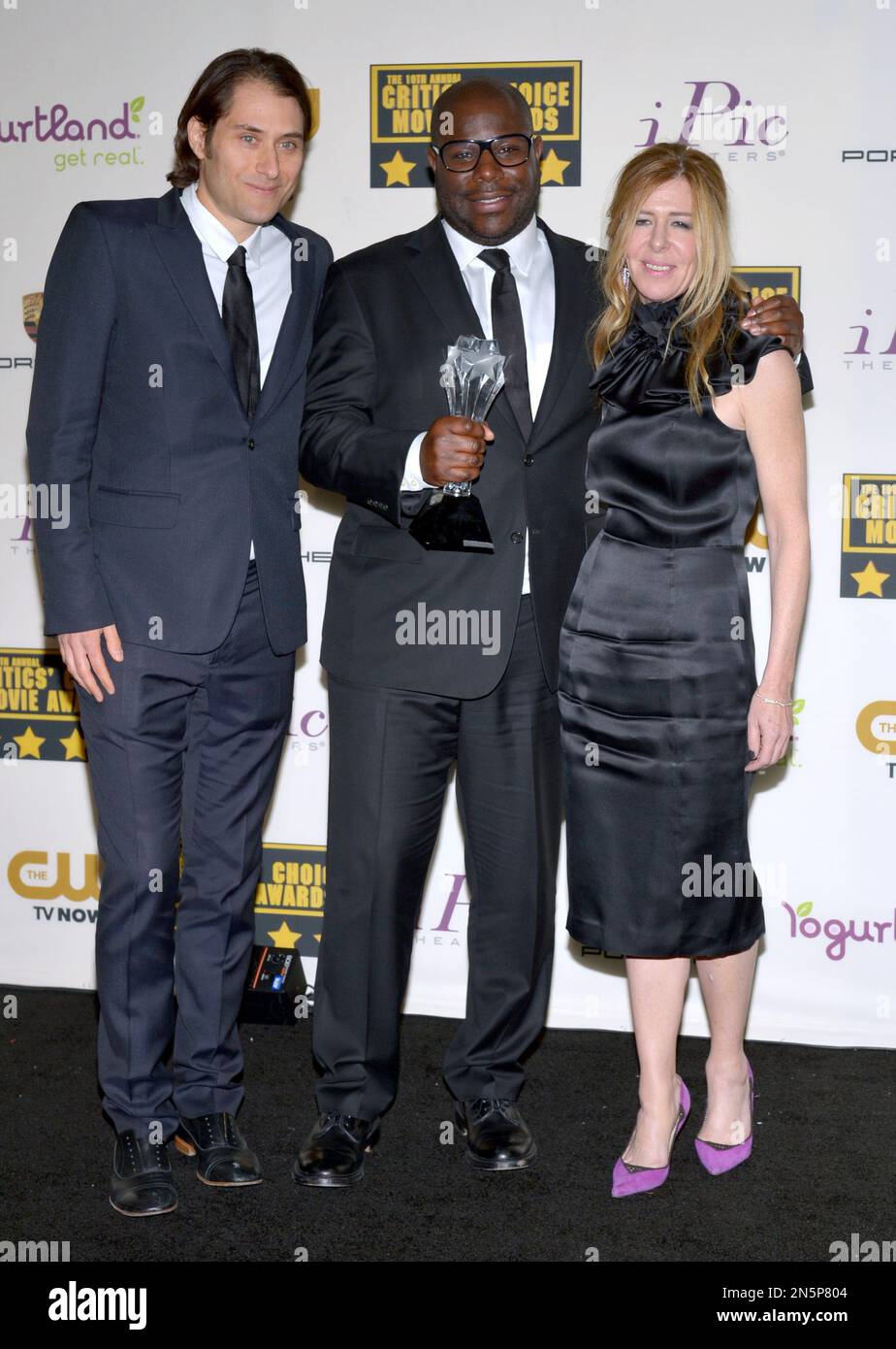 From left, Jeremy Kleiner, Steve McQueen and Dede Gardner pose in the ...