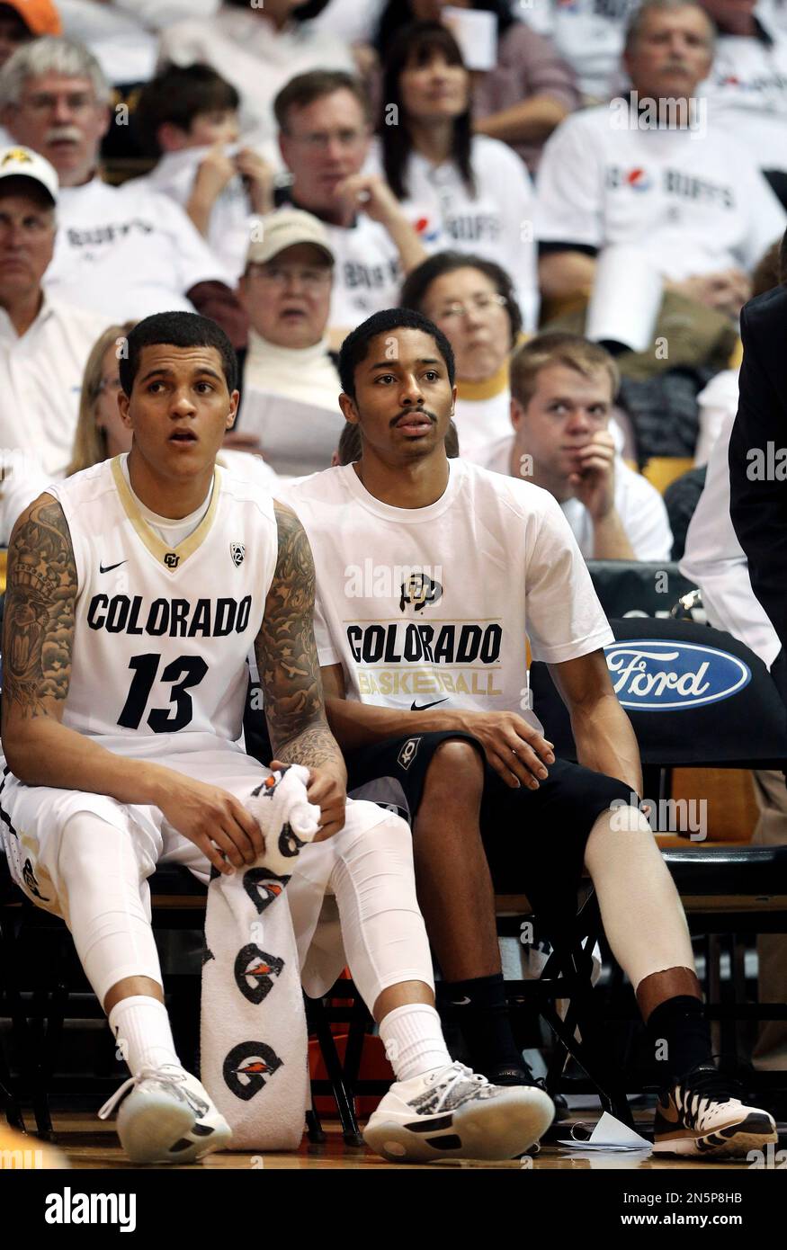 Colorado's Spencer Dinwiddie, right, who is out with an injury, sits on ...