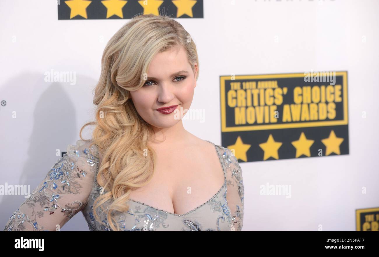 Abigail Breslin arrives at the 19th annual Critics' Choice Movie Awards at the Barker Hangar on ...