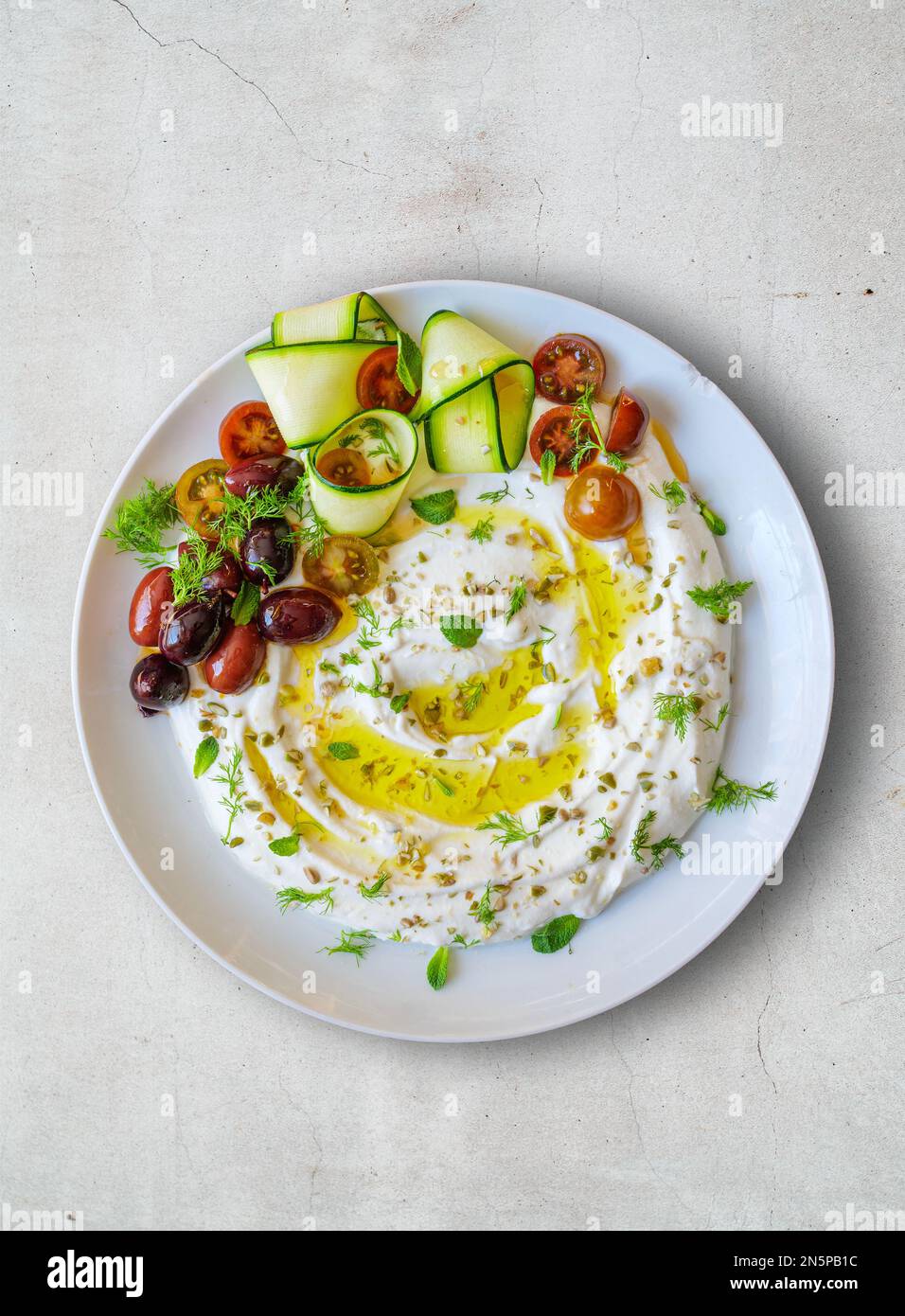 Labneh dip dish Stock Photo - Alamy