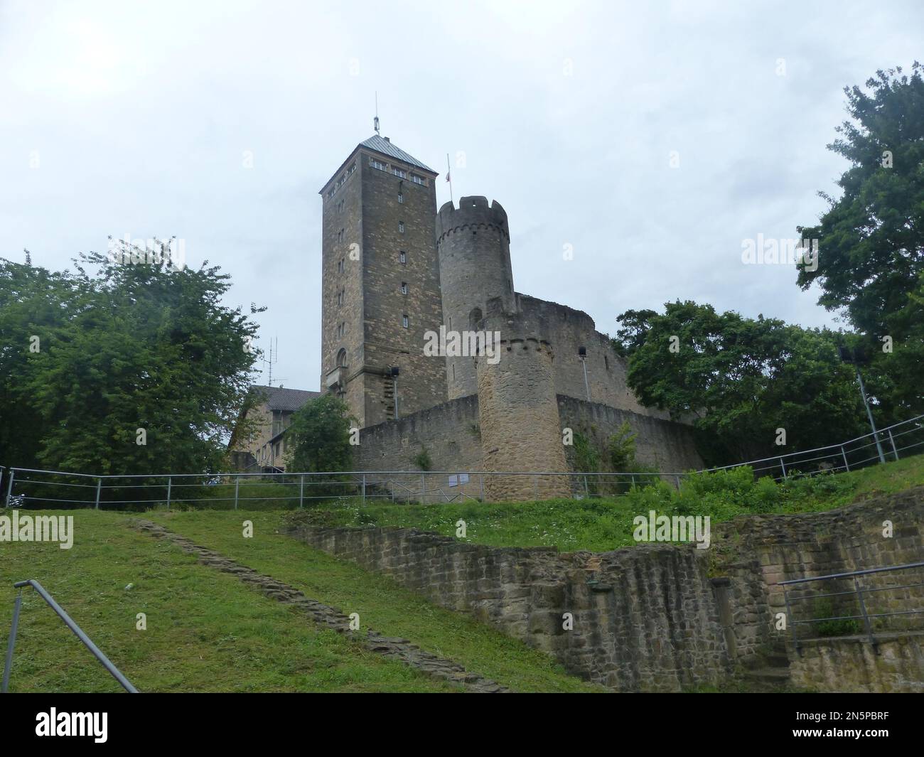 The exterior of the Starkenburg Ruin on green hill in Heppenheim ...