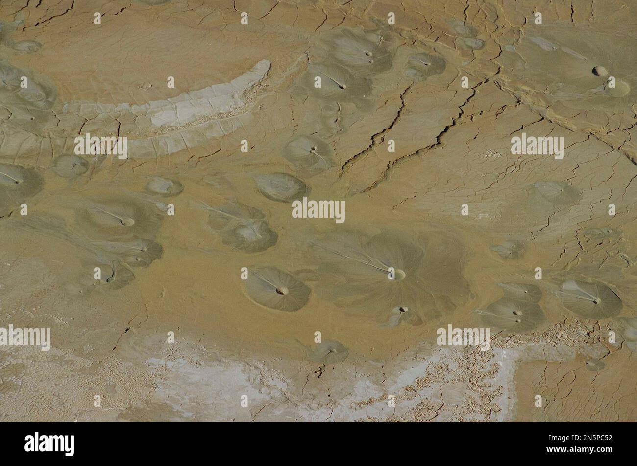 Sand boils, ranging in size from a foot to several feet in diameter ...