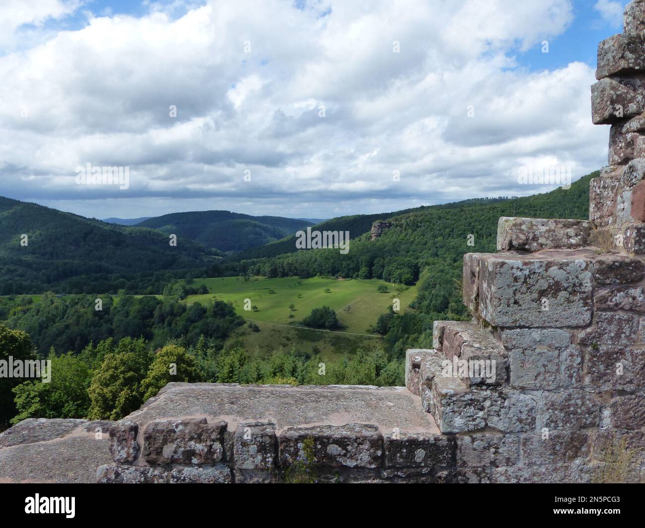 A beautiful view of old stone wall of the Castle of Fleckenstein in ...