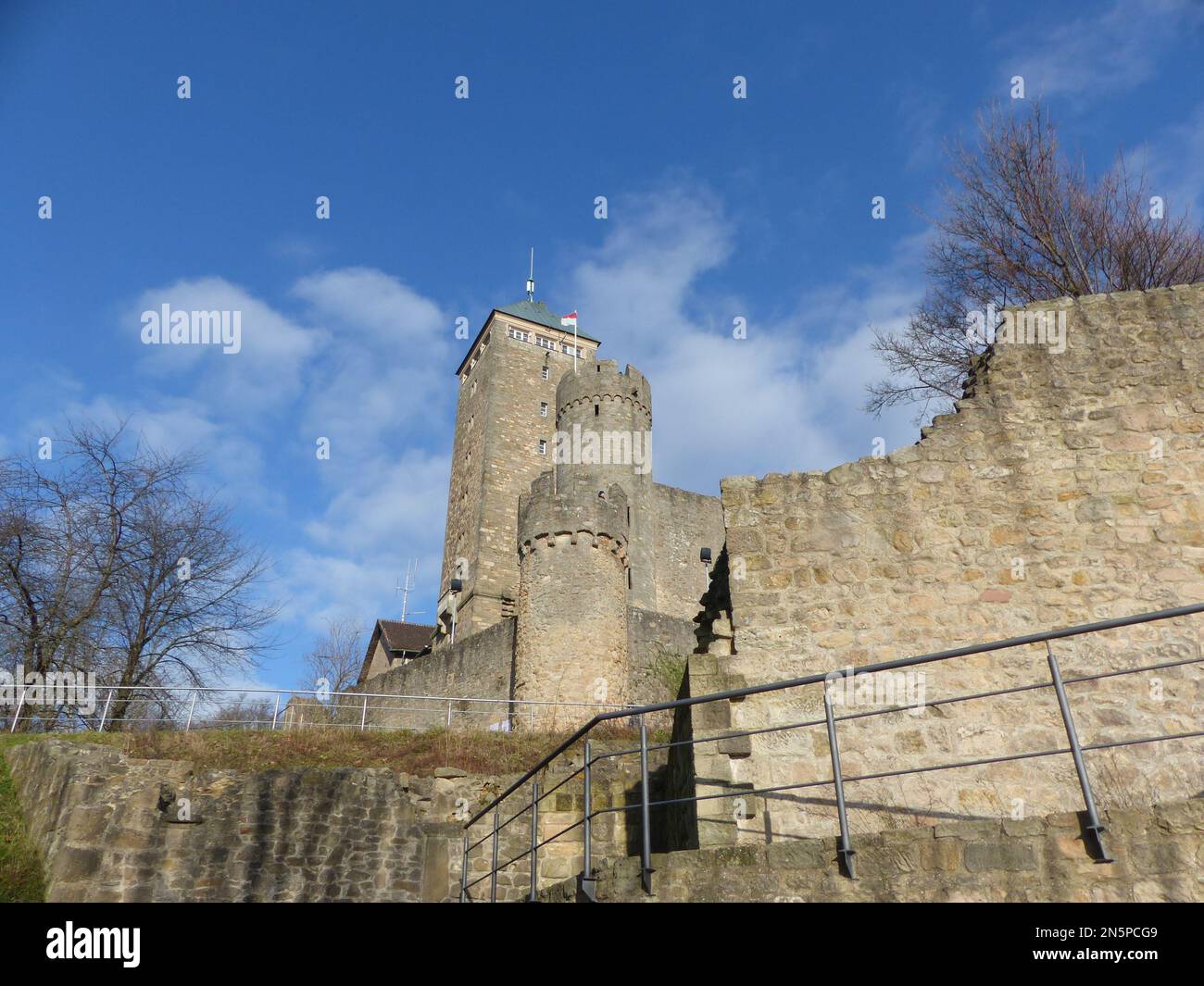 The exterior of the Starkenburg Ruin in Heppenheim, Germany with blue ...