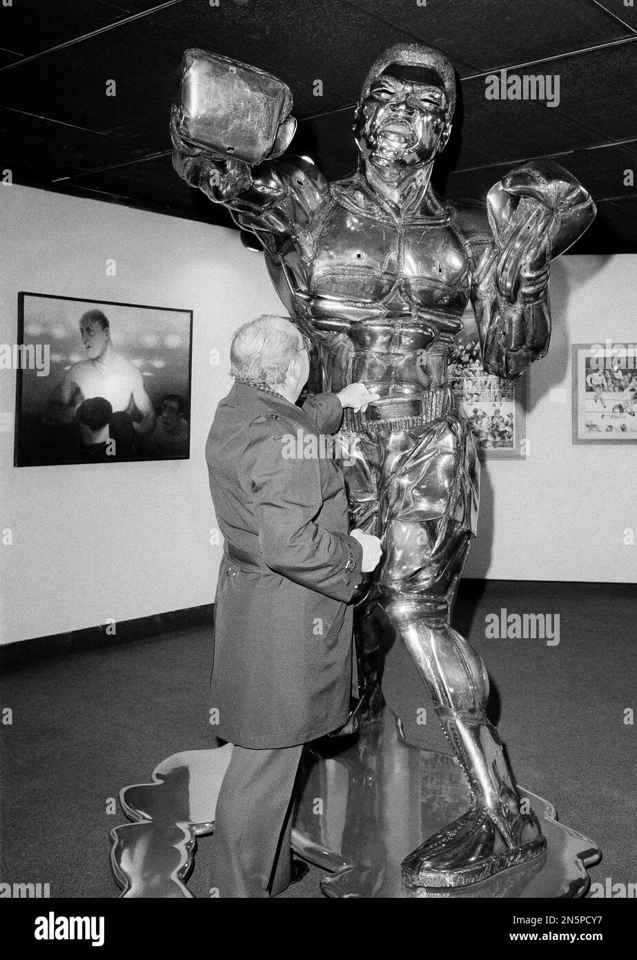 A 9-foot-tall, 1,100-pound statue of Muhammad Ali is displayed at the ...