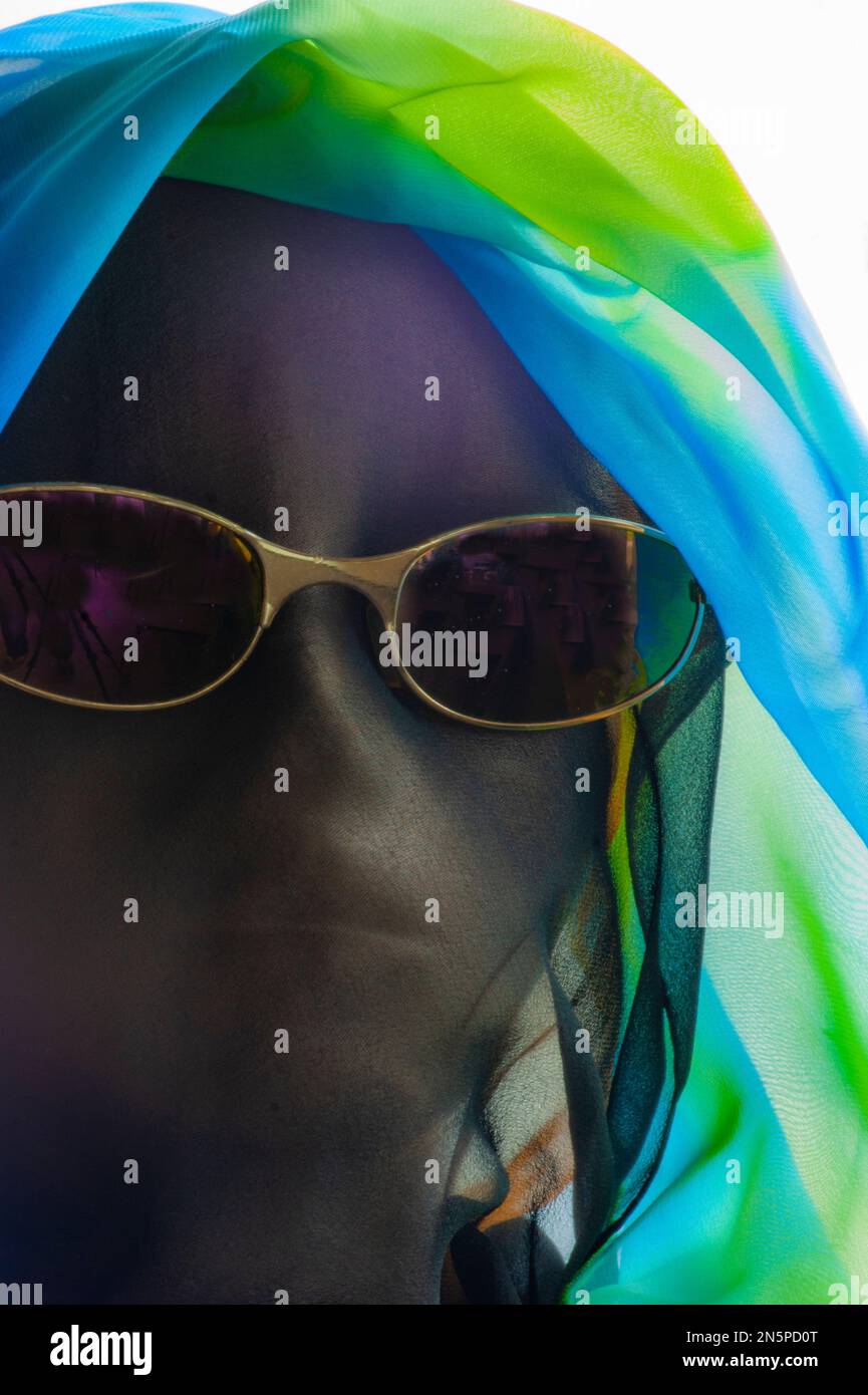 Head With Sunglasses And Scarf Is Made By The Photographer Using Soft Sculpture Technique Over