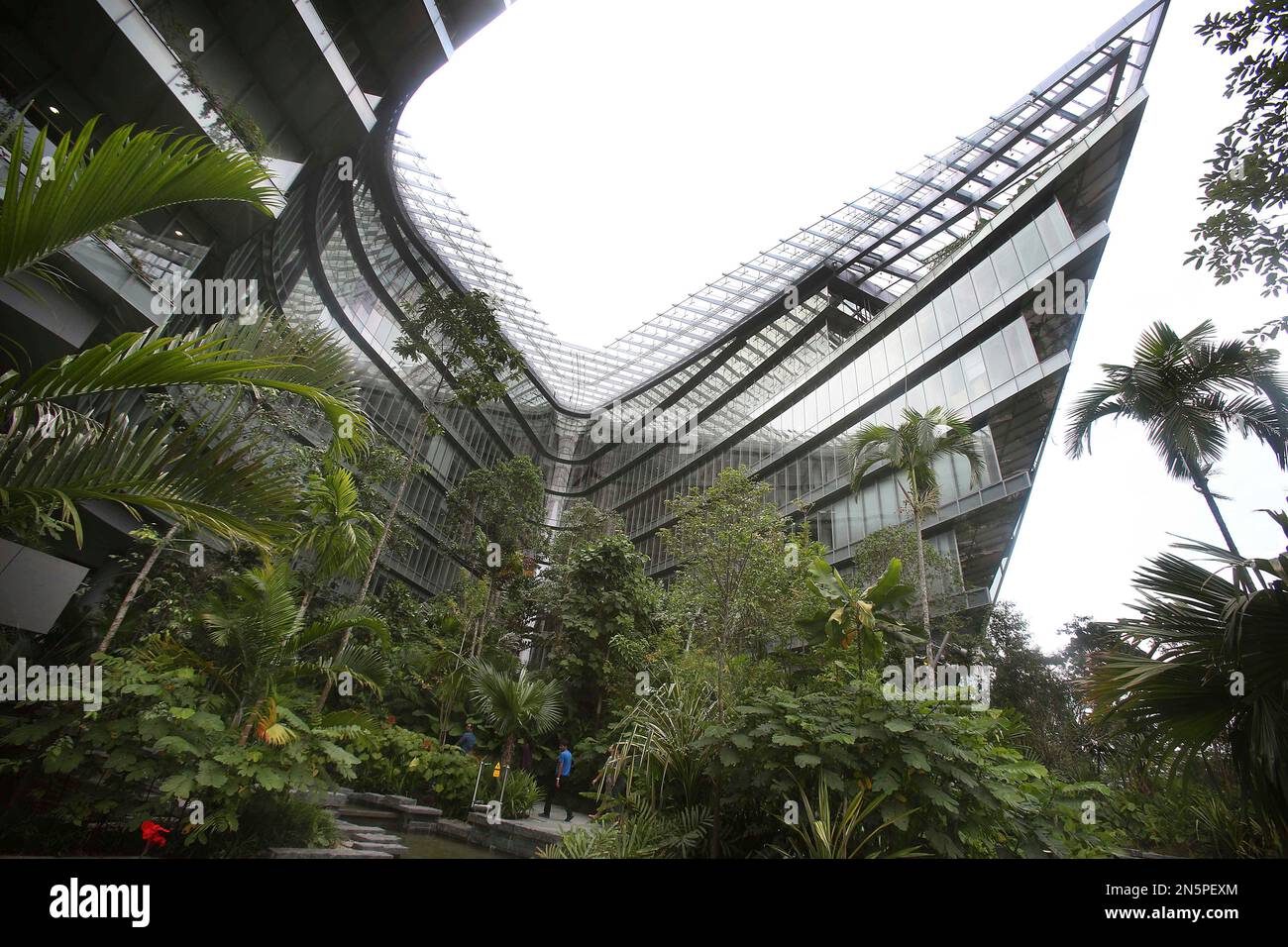 Employees walk through the courtyard of the "Sandcrawler" building ...