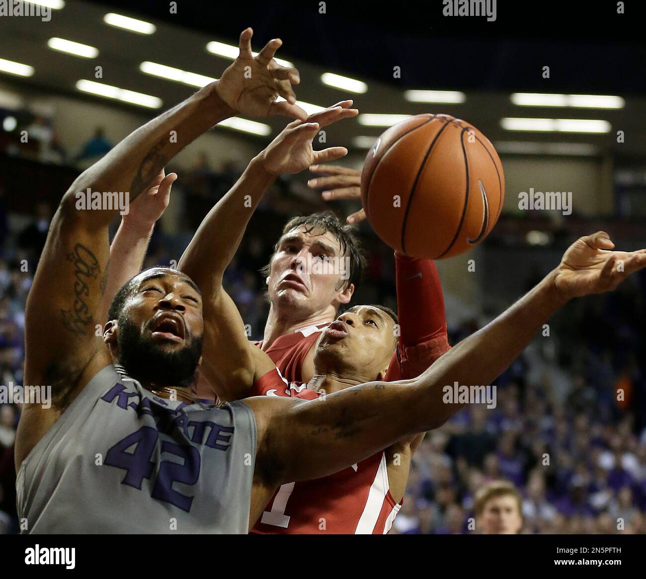 Kansas State's Thomas Gipson (42) battles Oklahoma's Ryan Spangler ...