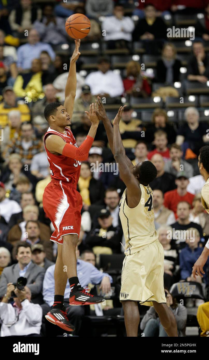 North Carolina State's Kyle Washington, left, shoots over Wake Forest's ...