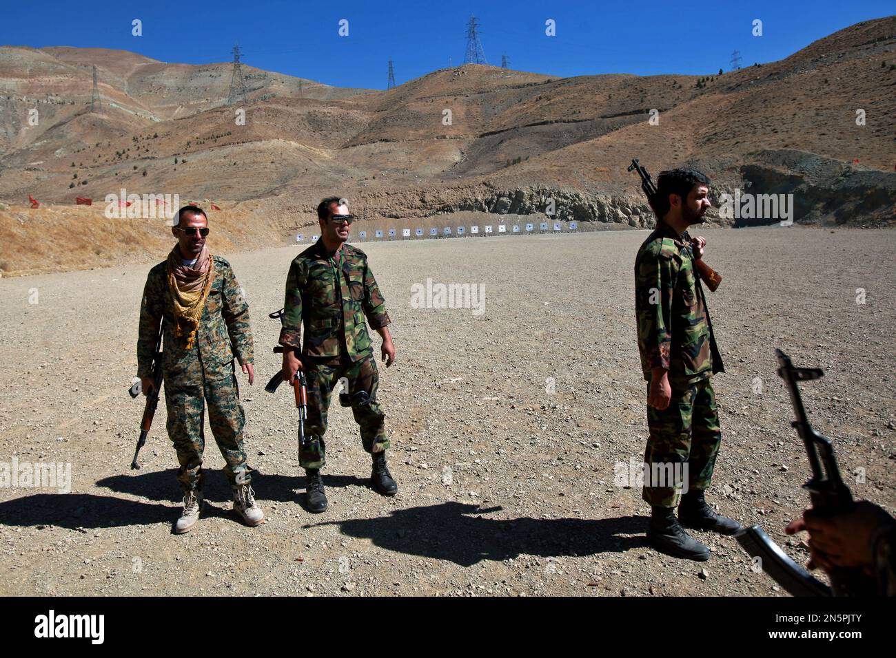 In this picture taken on Thursday, Sept. 19, 2013, trainers of the ...