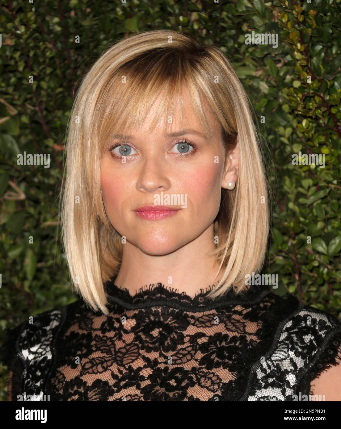 Reese Witherspoon arrives at the Chanel Dinner celebrating the release ...