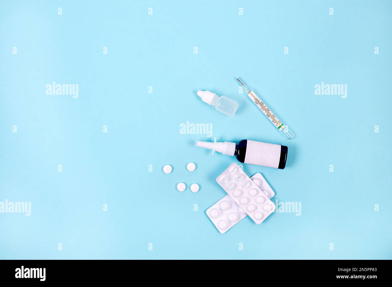 Medicines for treatment- pills, spray bottles, blister and thermometer ...