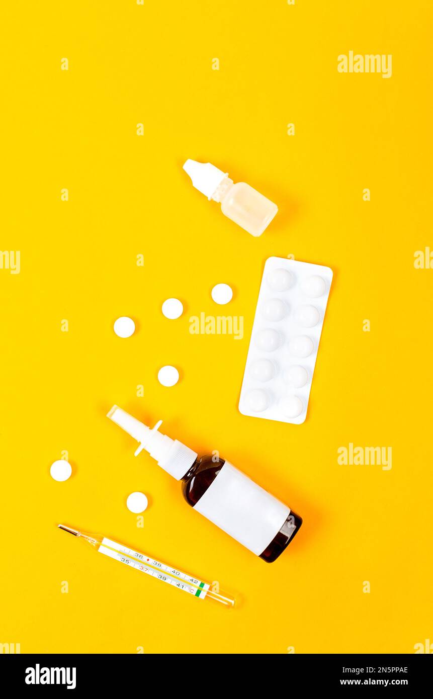 Medicines for treatment- pills, spray bottles, blister and thermometer ...