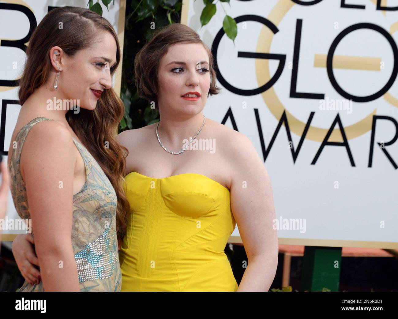 Jemima Kirke, left, and Lena Dunham arrive at the 71st annual Golden ...