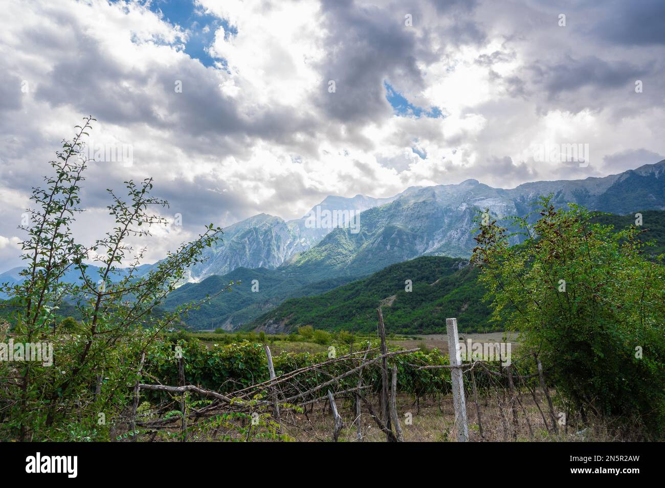 A landscape scene of mountains in Albania near the Vjose river with ...