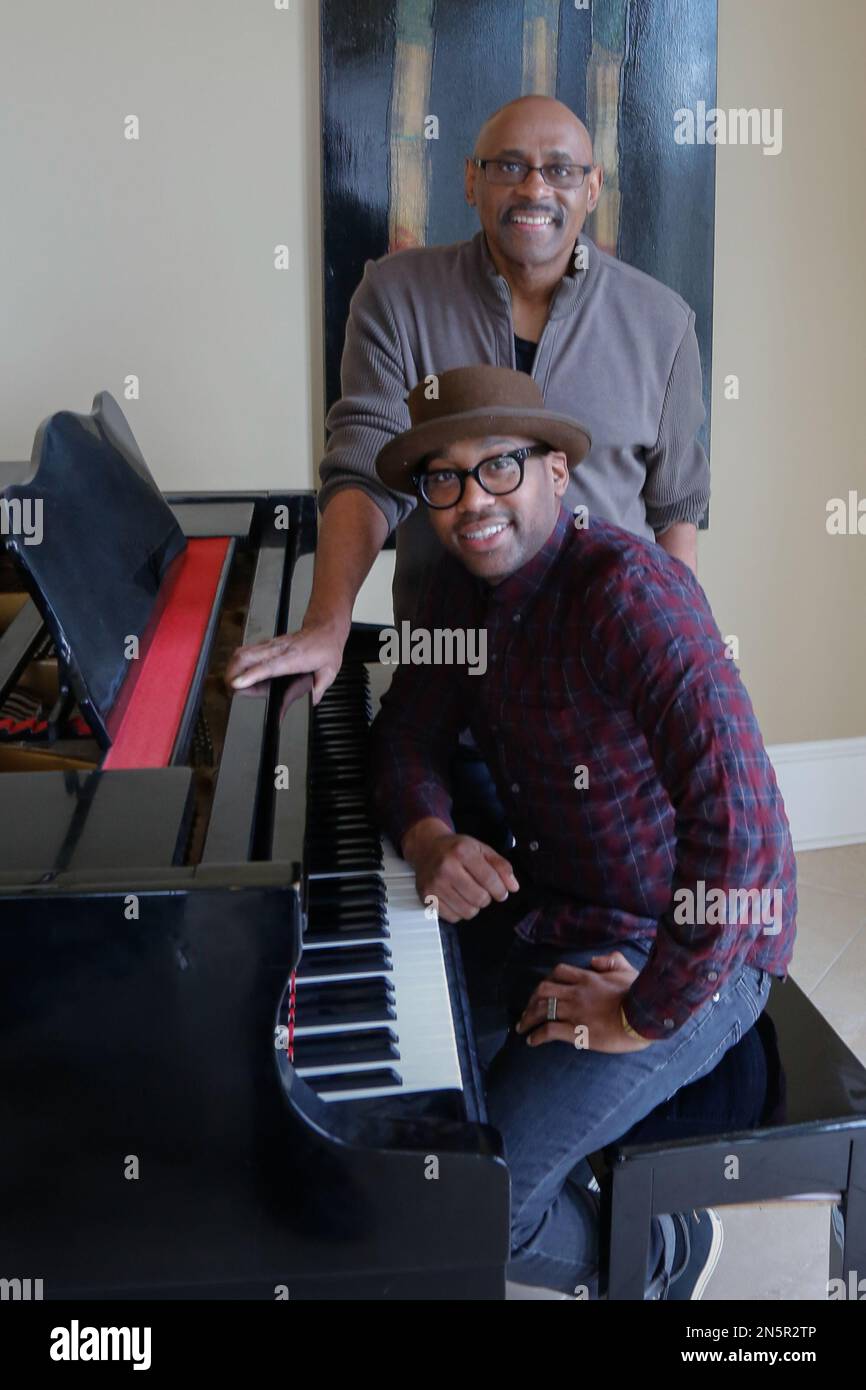 This Dec. 26, 2013 photo shows Bishop Paul Morton, background, and his ...