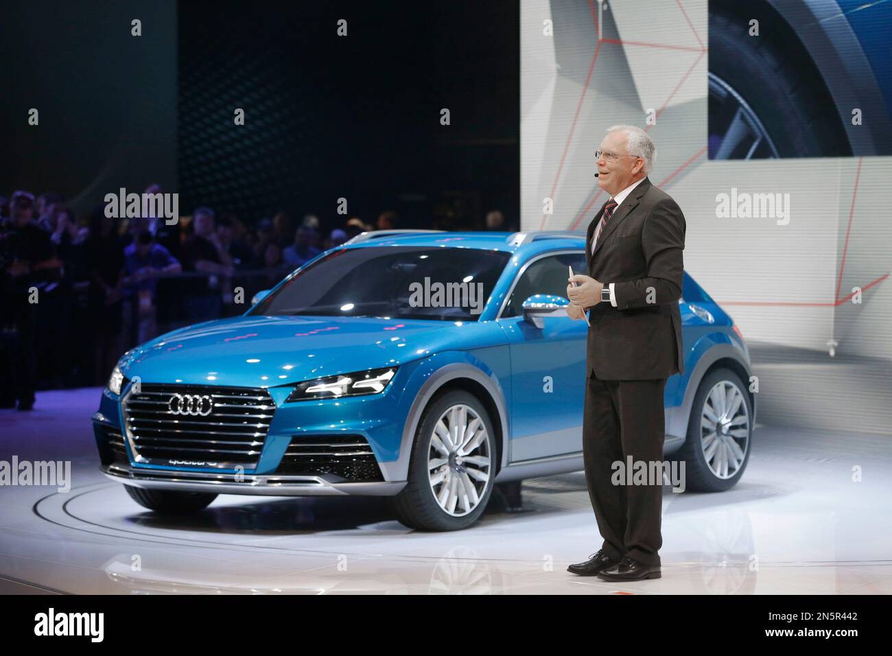 Audi Chief Technical Officer Ulrich Hackenberg stands next to the Audi ...